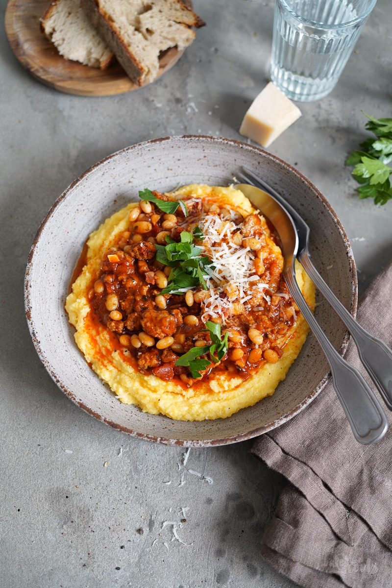 Sausage & Bacon Ragù with White Beans and Polenta | BTTR