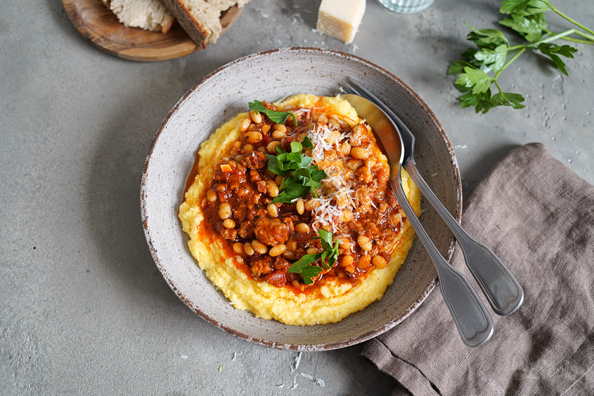 Sausage & Bacon Ragù with White Beans and Polenta | Bake to the roots ...